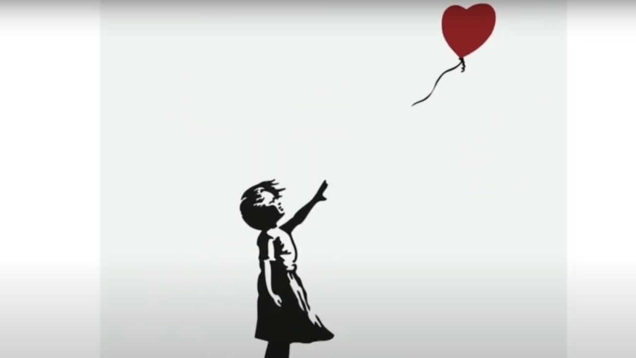 Girl with Balloon Explained: The Meaning Behind Banksy’s Graffiti