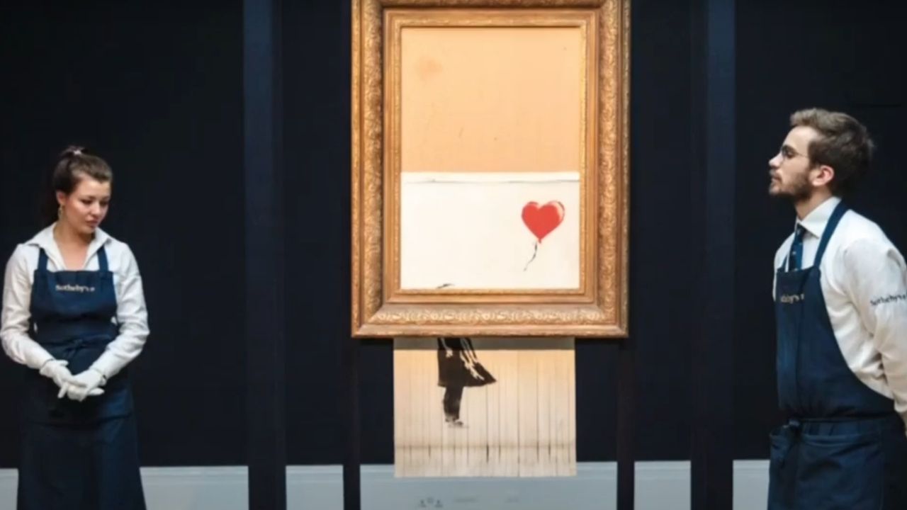 Girl with Balloon Explained: The Meaning Behind Banksy’s Graffiti
