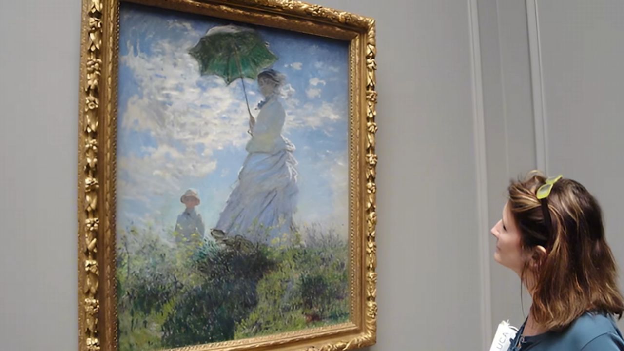 Woman with a Parasol Explained: The Meaning Behind Monet’s ...