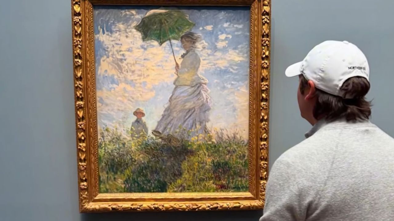 Woman with a Parasol Explained: The Meaning Behind Monet’s ...